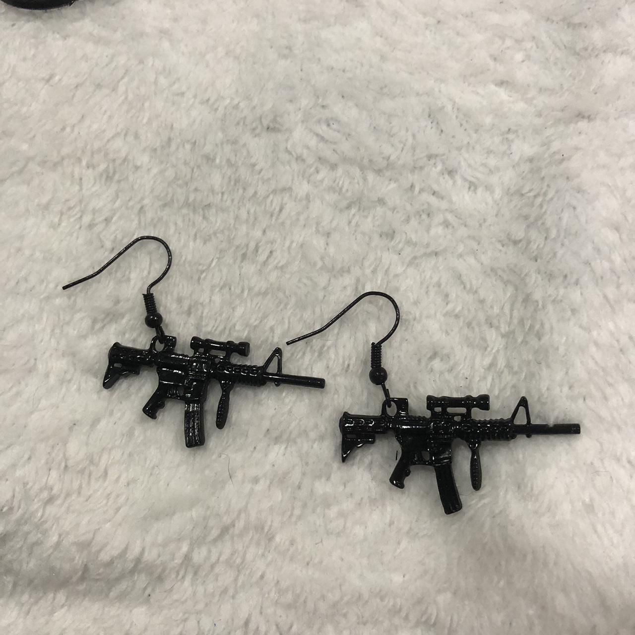 Various never worn black emo weapon earrings. Each... - Depop