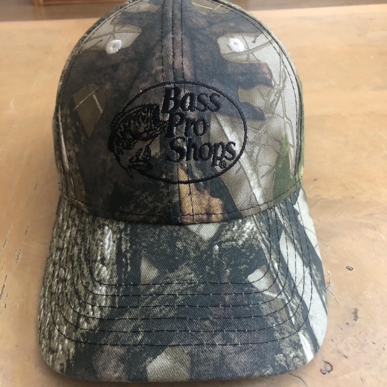 Bass pro camo hat in pristine condition. Fits all... - Depop