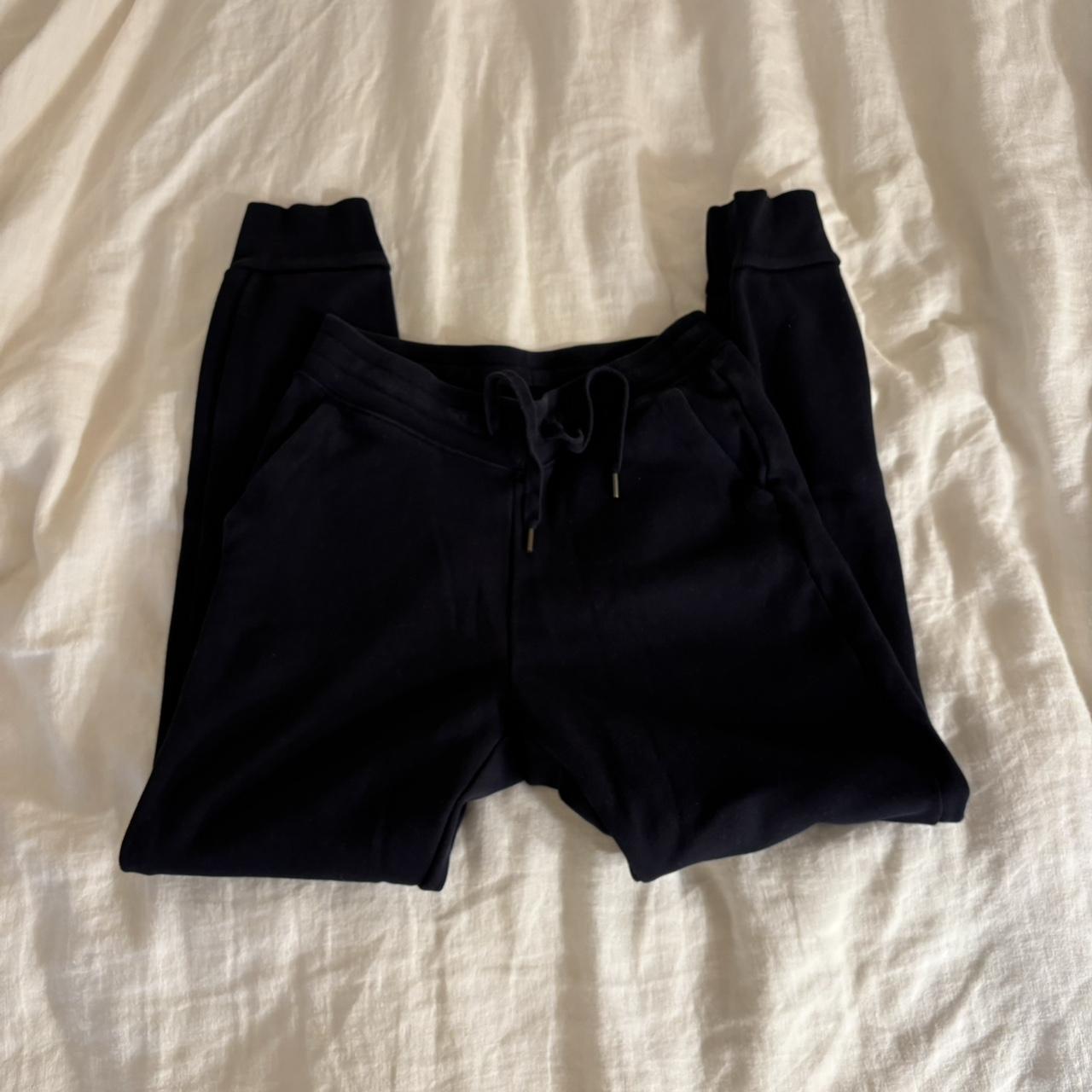 Navy blue Uniqlo joggers size xs a little faded... - Depop