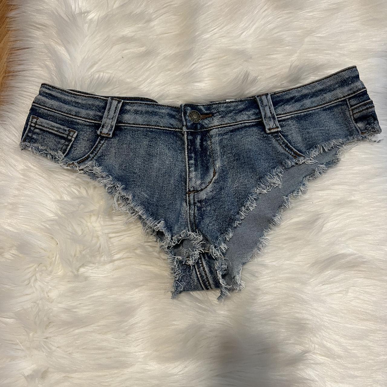 Denim booty shorts can fit a size medium or... - Depop
