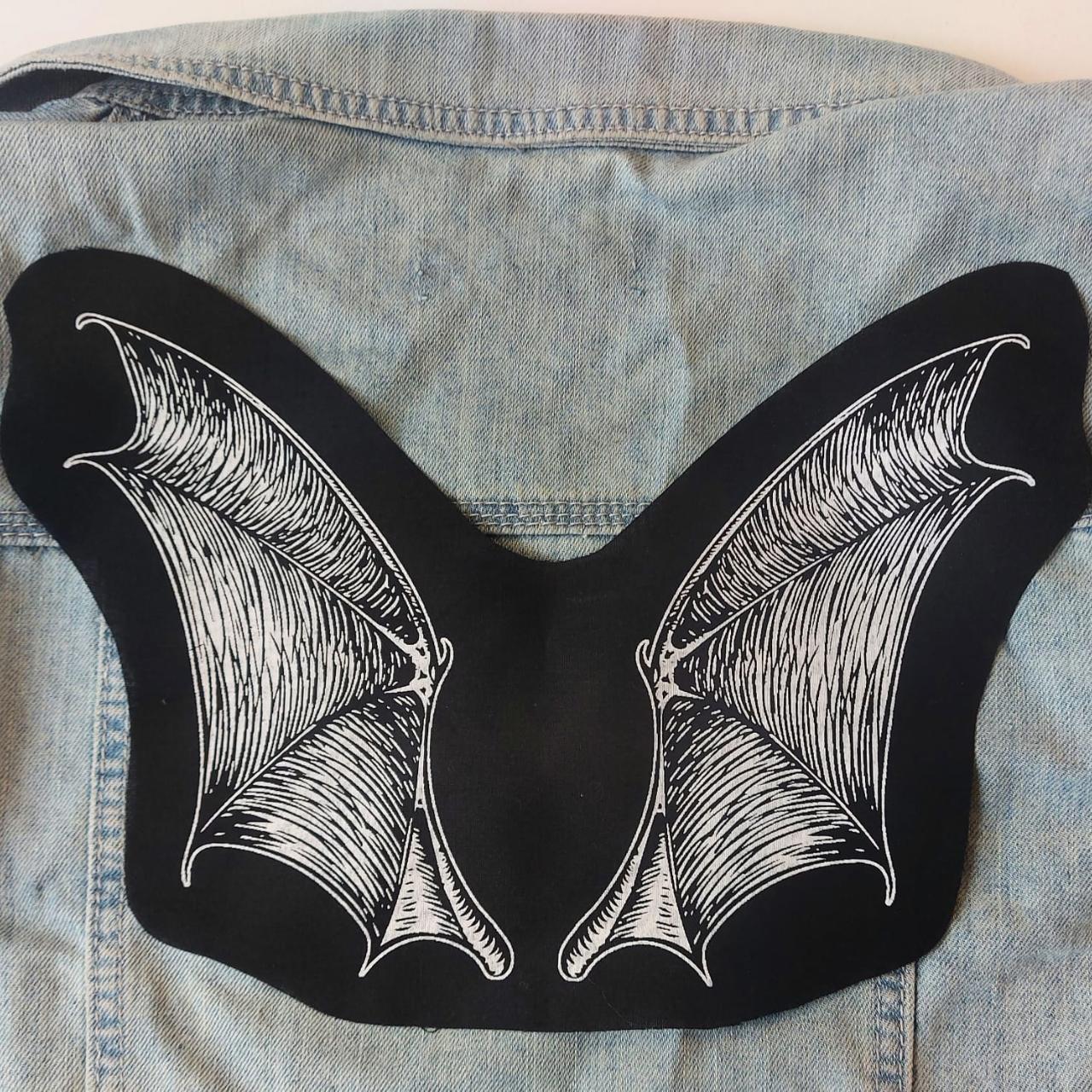 Back patch of a pair of demon wings. Screen printed... - Depop