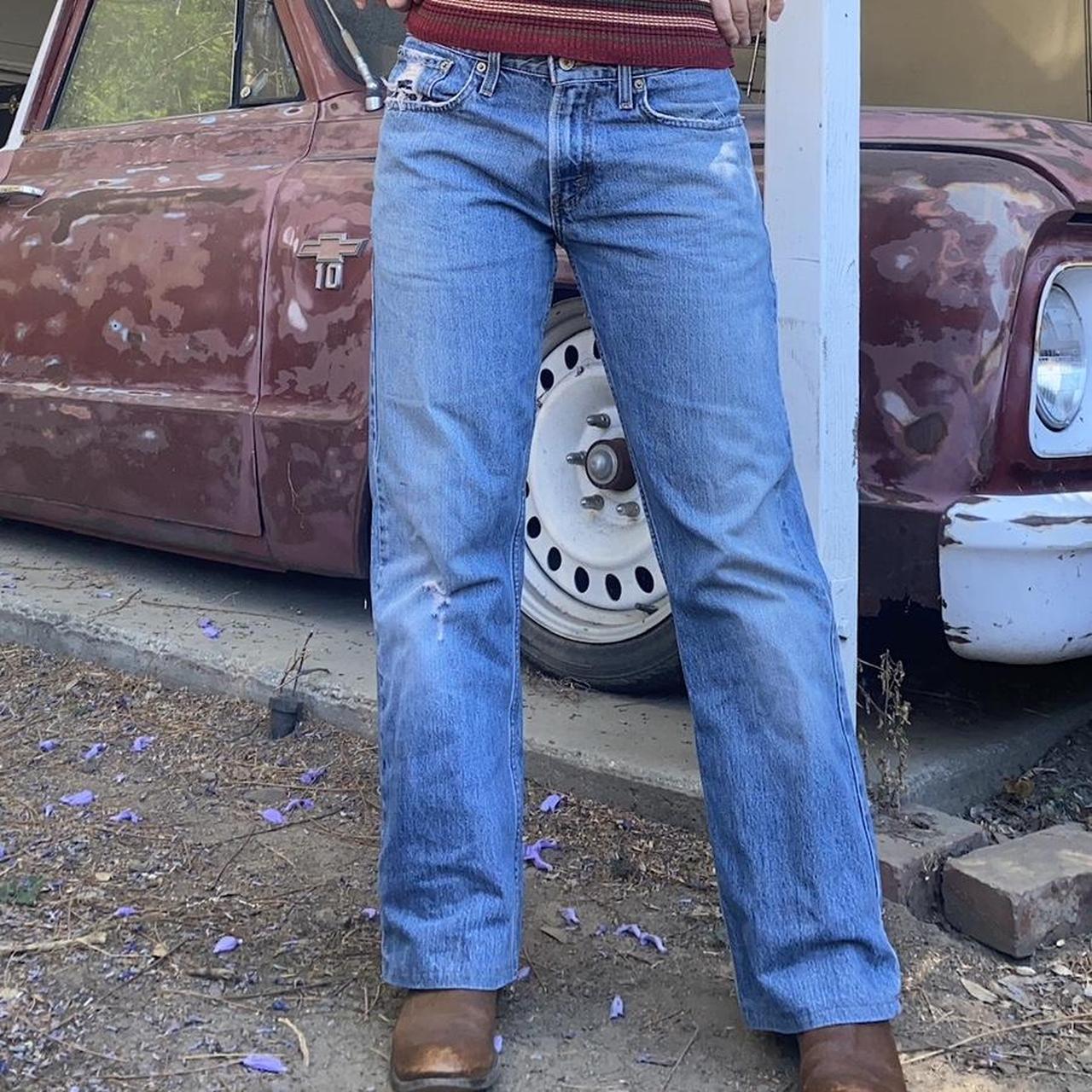 80s Levi's red tab low waisted bootcut jeans - super... - Depop