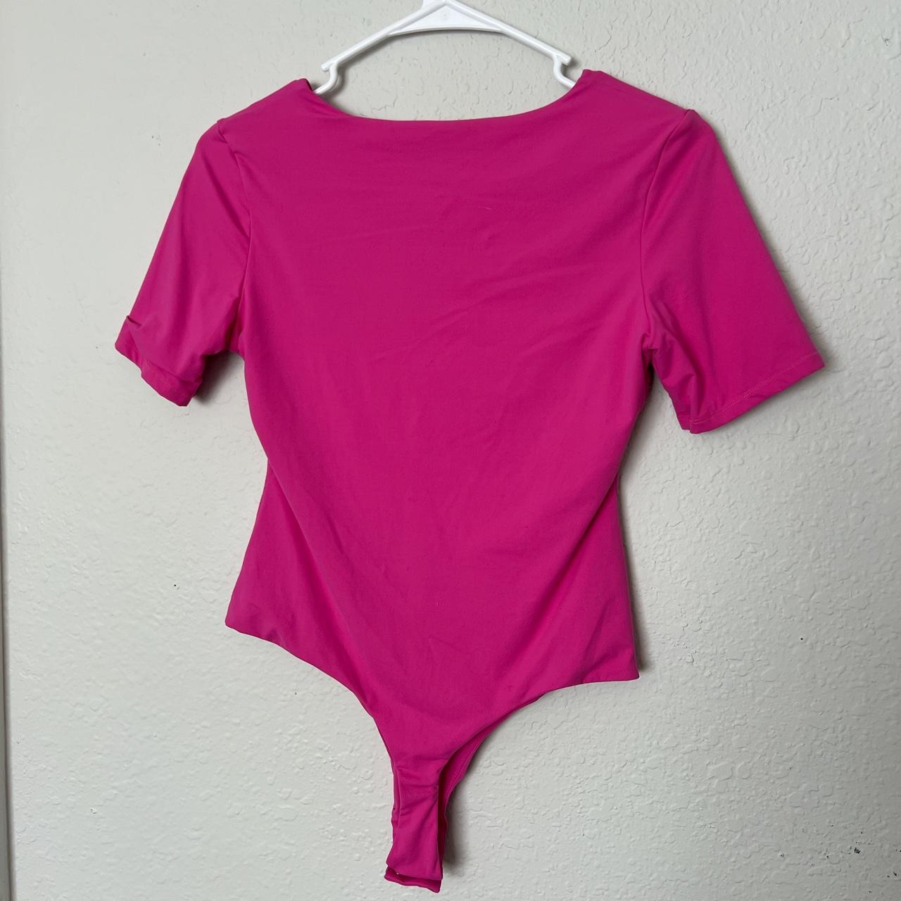 Hot pink stretchy and super comfortable bodysuit... - Depop
