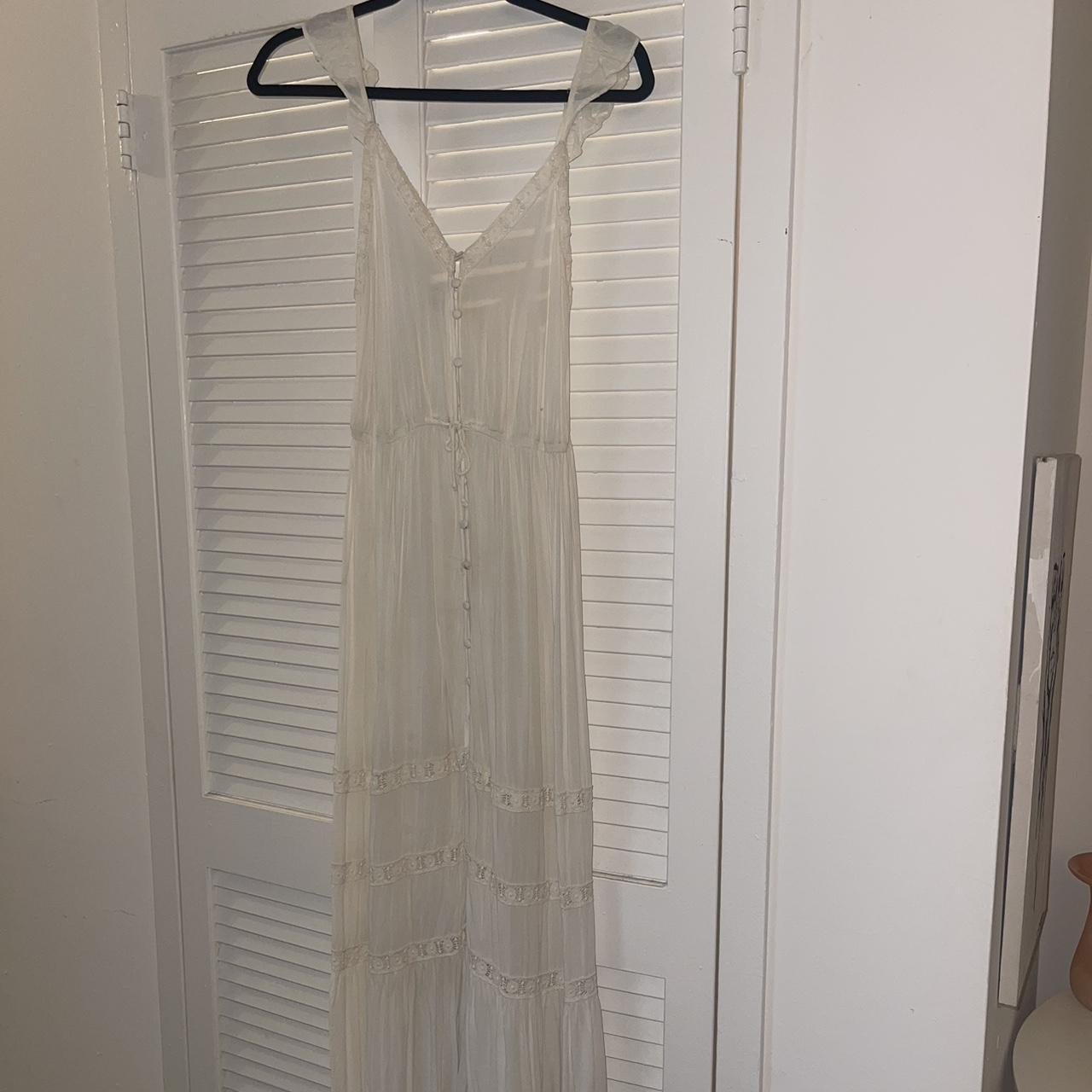 White flowy maxi dress with ruffle sleeves and... - Depop