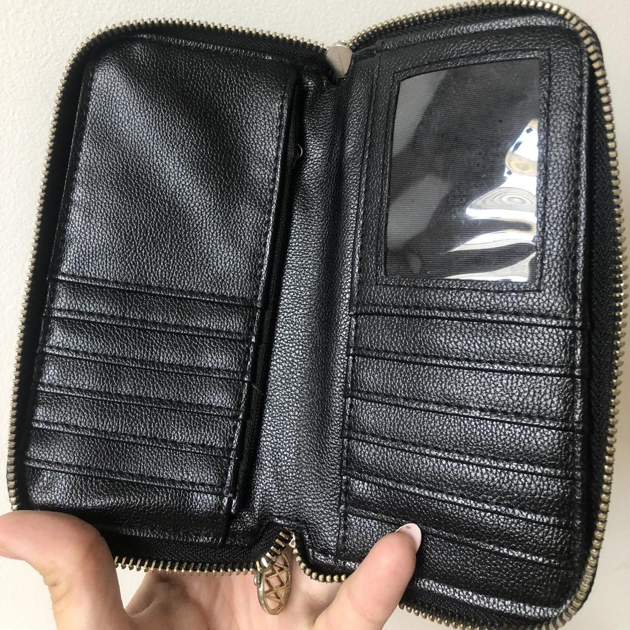 black and gold marikai wallet features two... - Depop