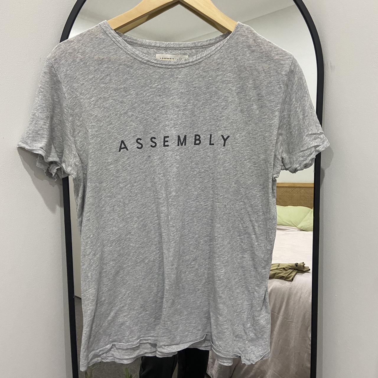 Assembly label grey t-shirt - tiny mark below the S... - Depop