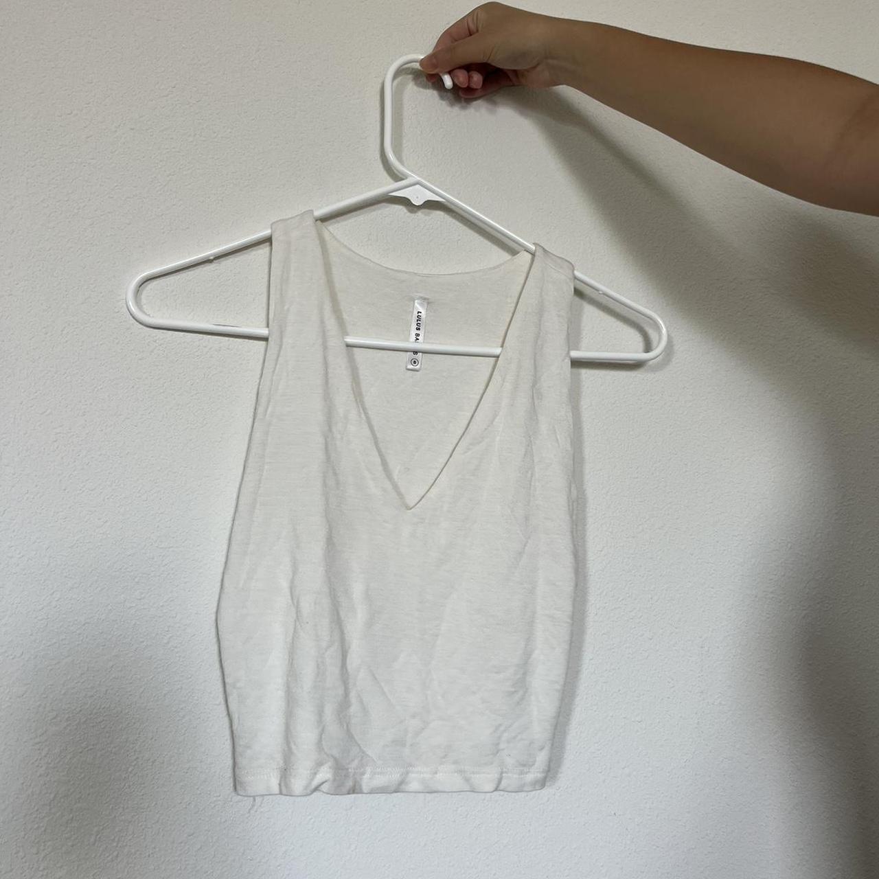 Lulus basics white comfy v neck tank top size... - Depop