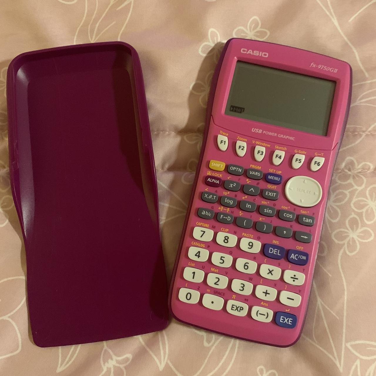 Pink Casio graphing calculator - great for maths and... - Depop