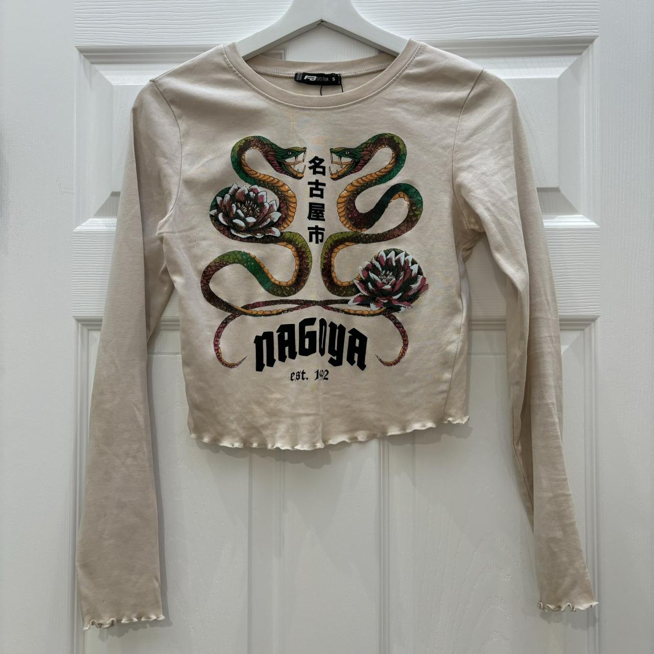 Dragon print graphic long sleeve crop top Brought... - Depop