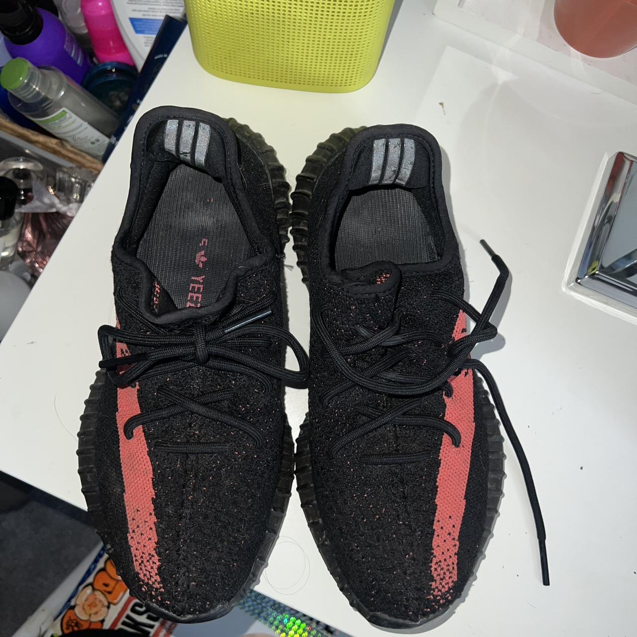 Black and red Yeezy Boost 350 V2 trainers #sneakers... | Depop
