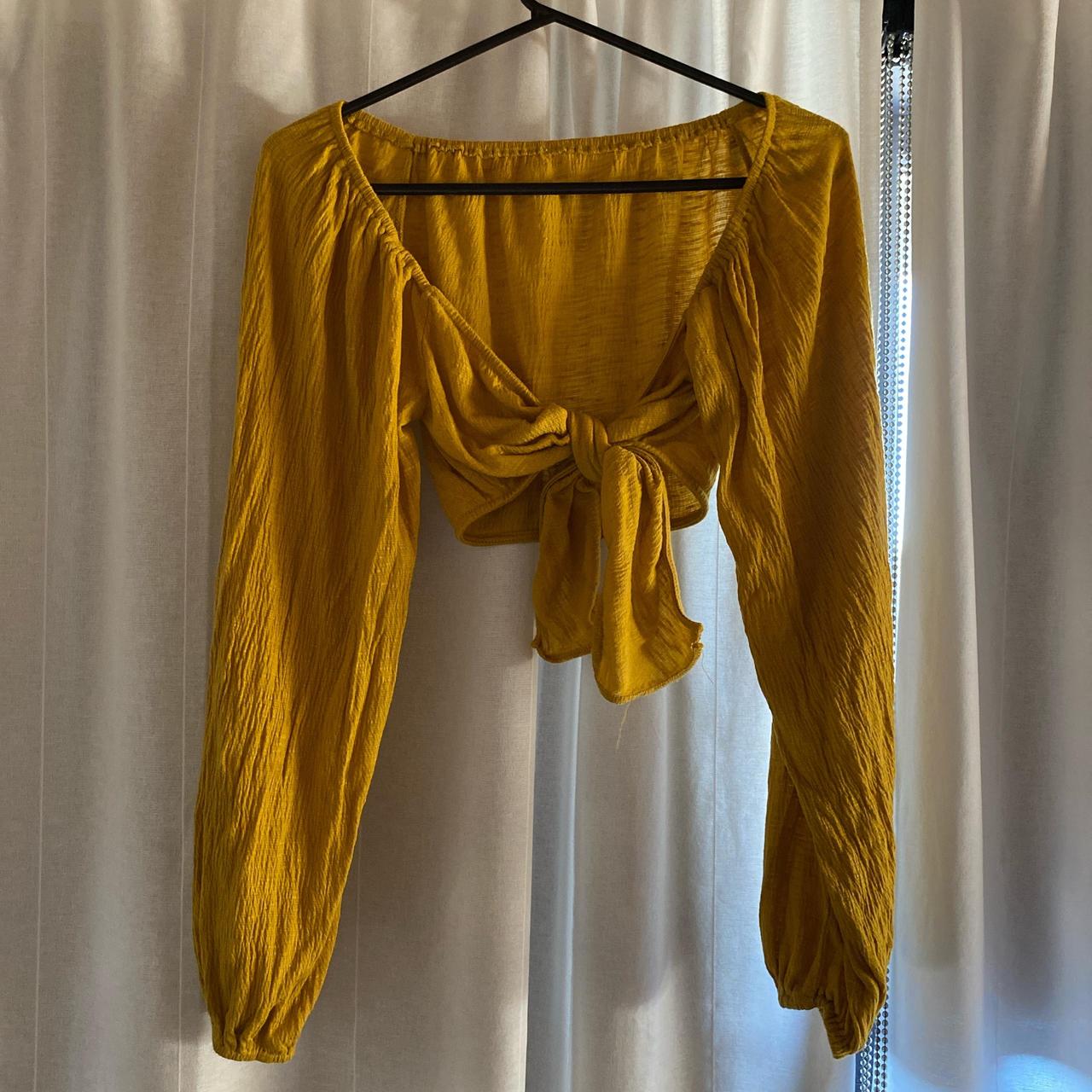Yellow wrap top Found at market No tags would fit... - Depop