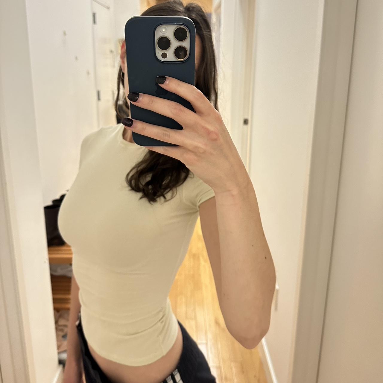 Skims stretch cotton tee in the color bone - Depop