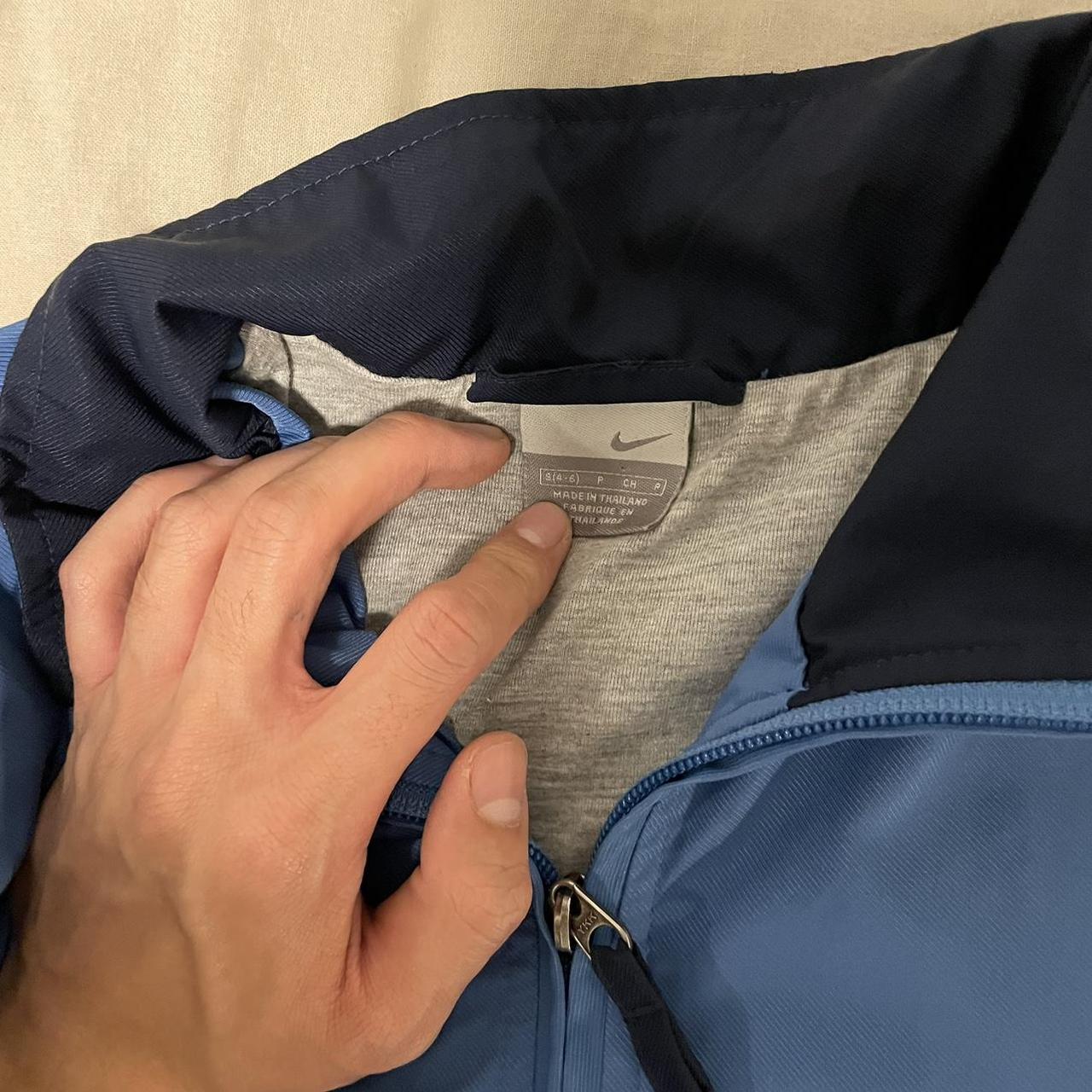 Nike blue running jacket size S - Depop