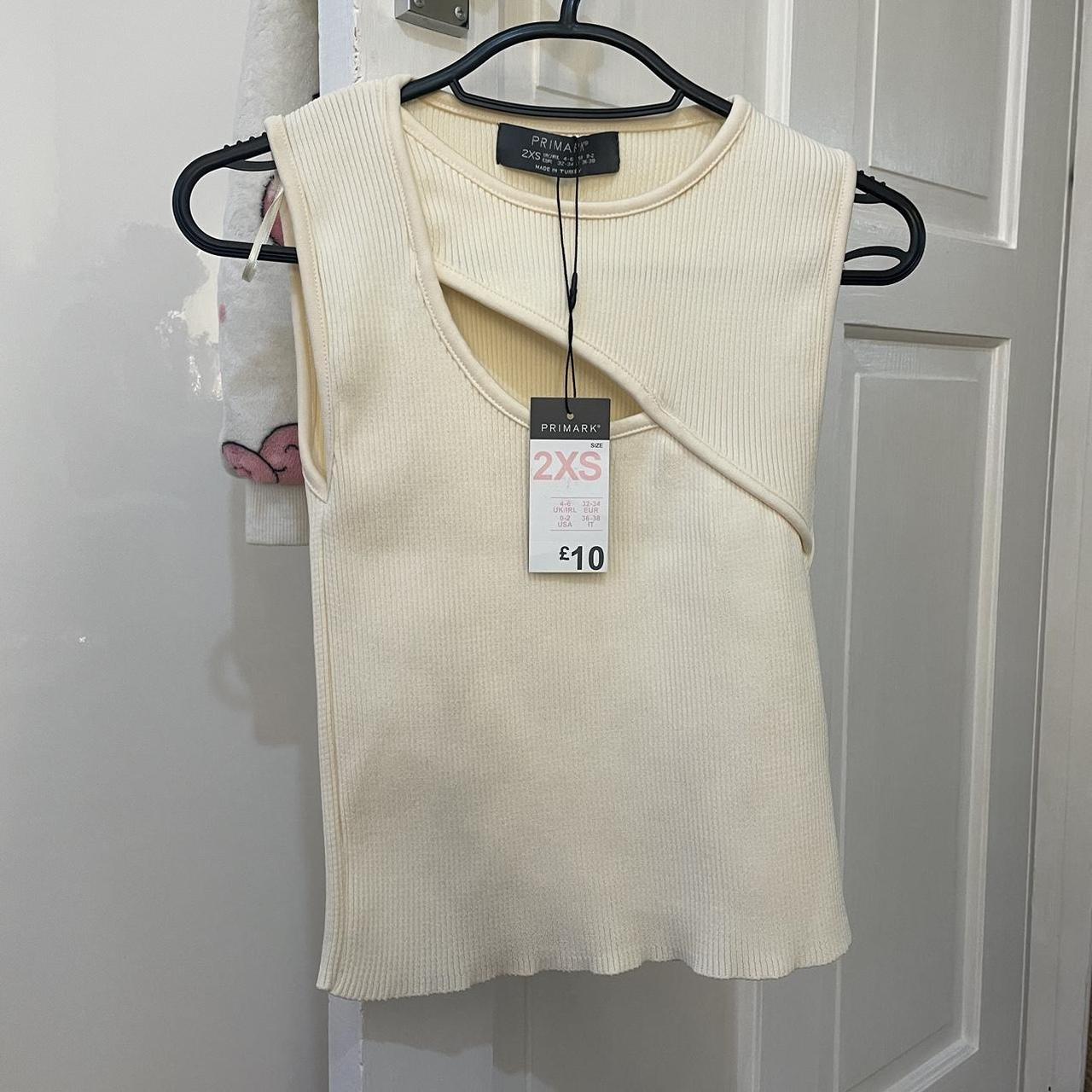 primark ribbed cream cut out racer top size... - Depop