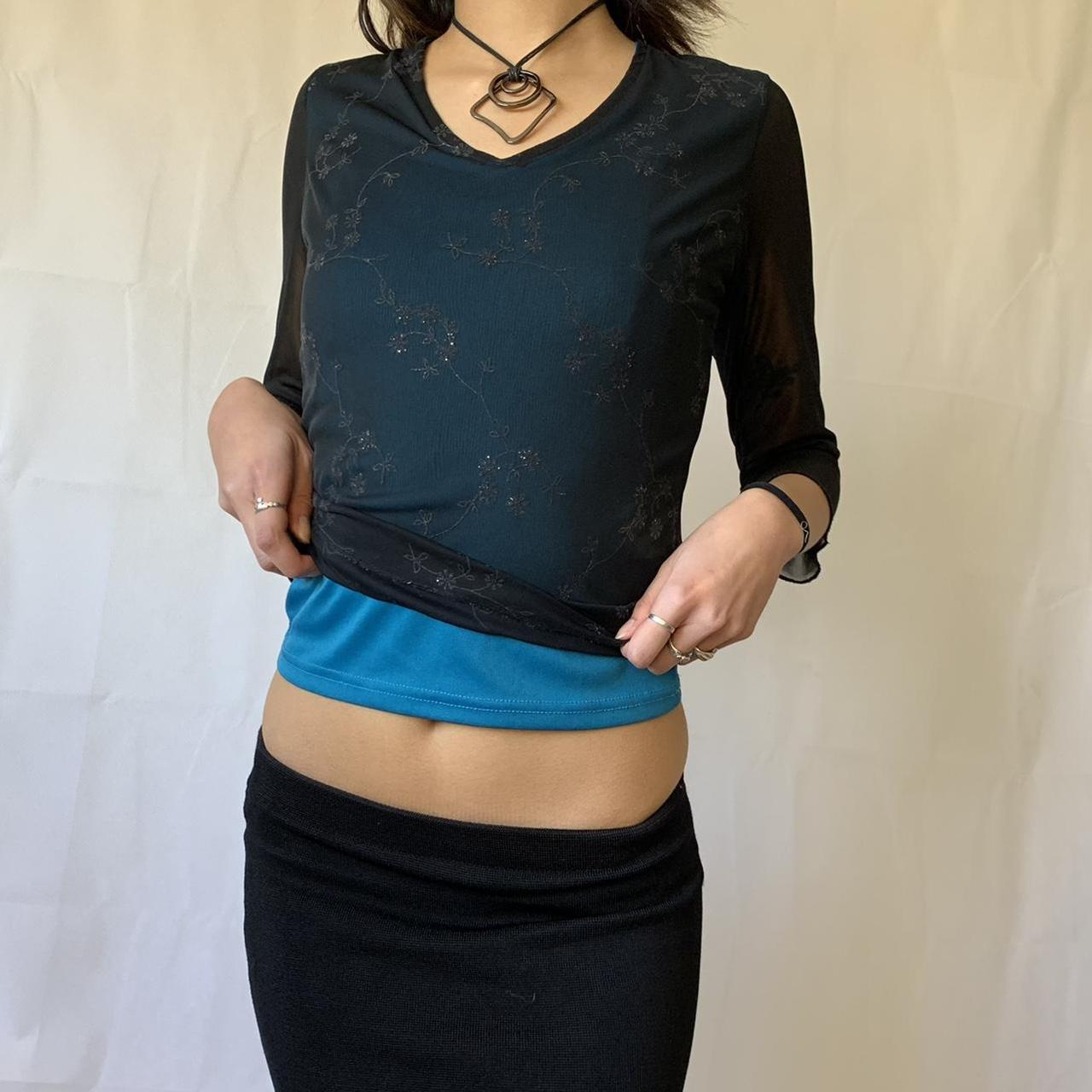 black and blue mesh style top. floral detailing... - Depop