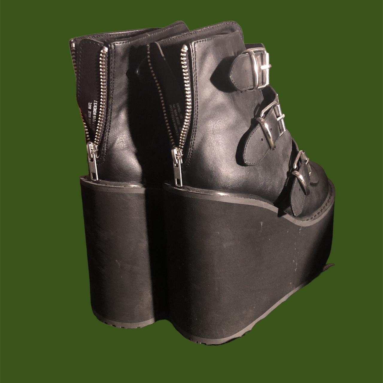 Demonia Women's Black and Silver Boots | Depop