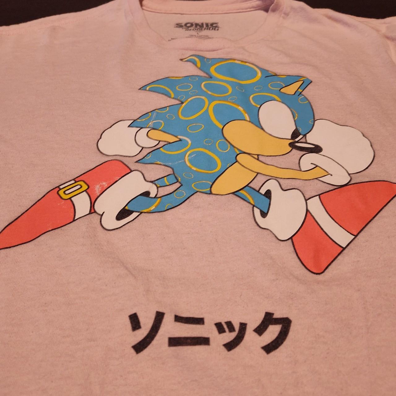 Sonic with kanji design on light pink shirt. Really... - Depop