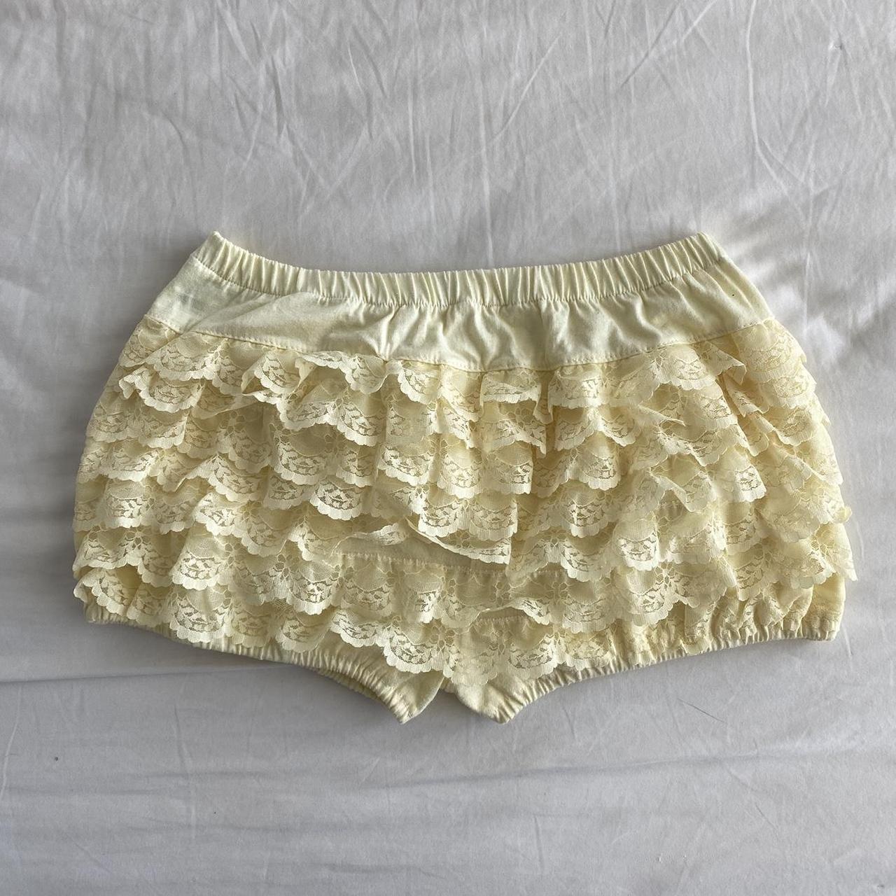 Yellow lace ruffle bloomers Waist and leg openings... - Depop