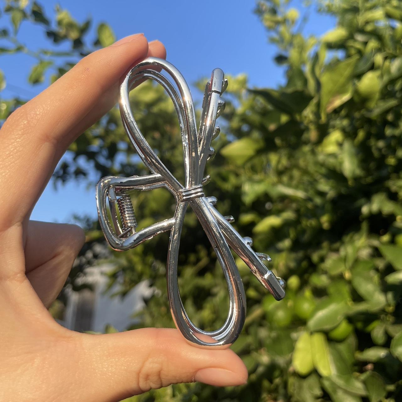 Silver string bow hairclip claw clip Sooo pretty 😍... - Depop