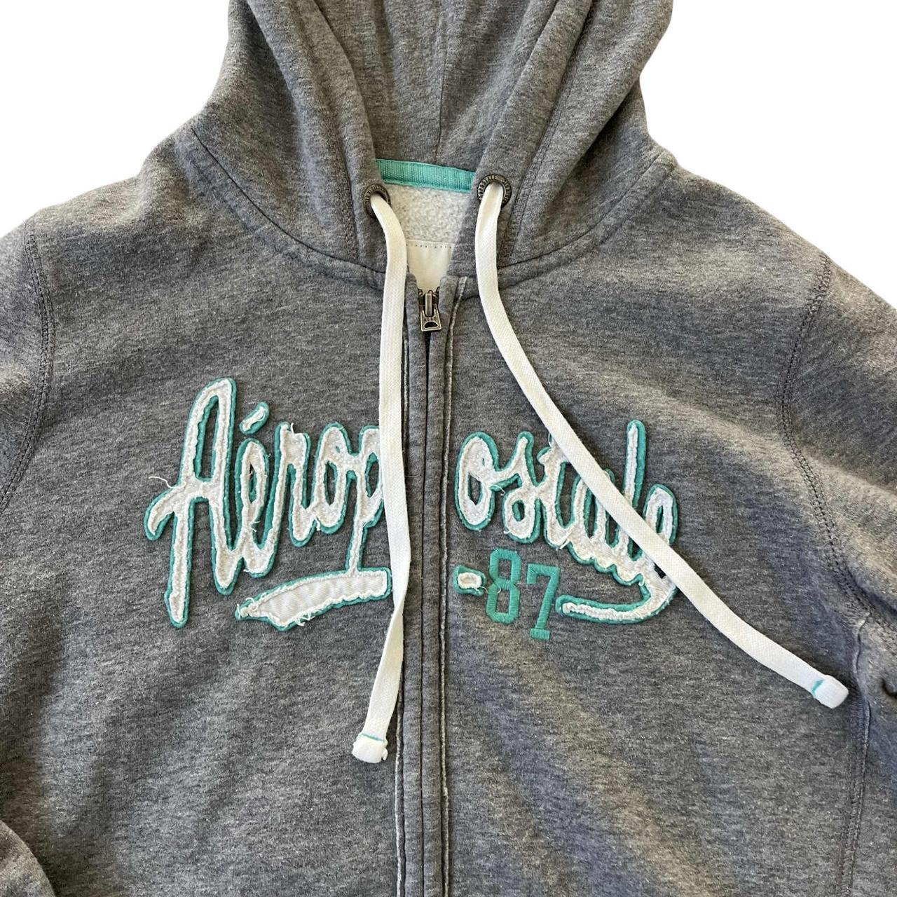 Grey Aeropostale zip-up hoodie with embroidery... | Depop