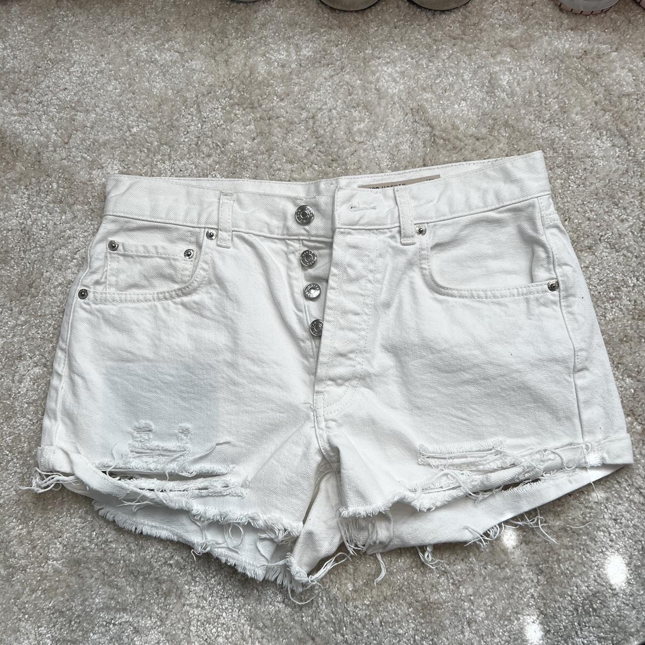 Ripped white denim shorts. Size 10 - Depop