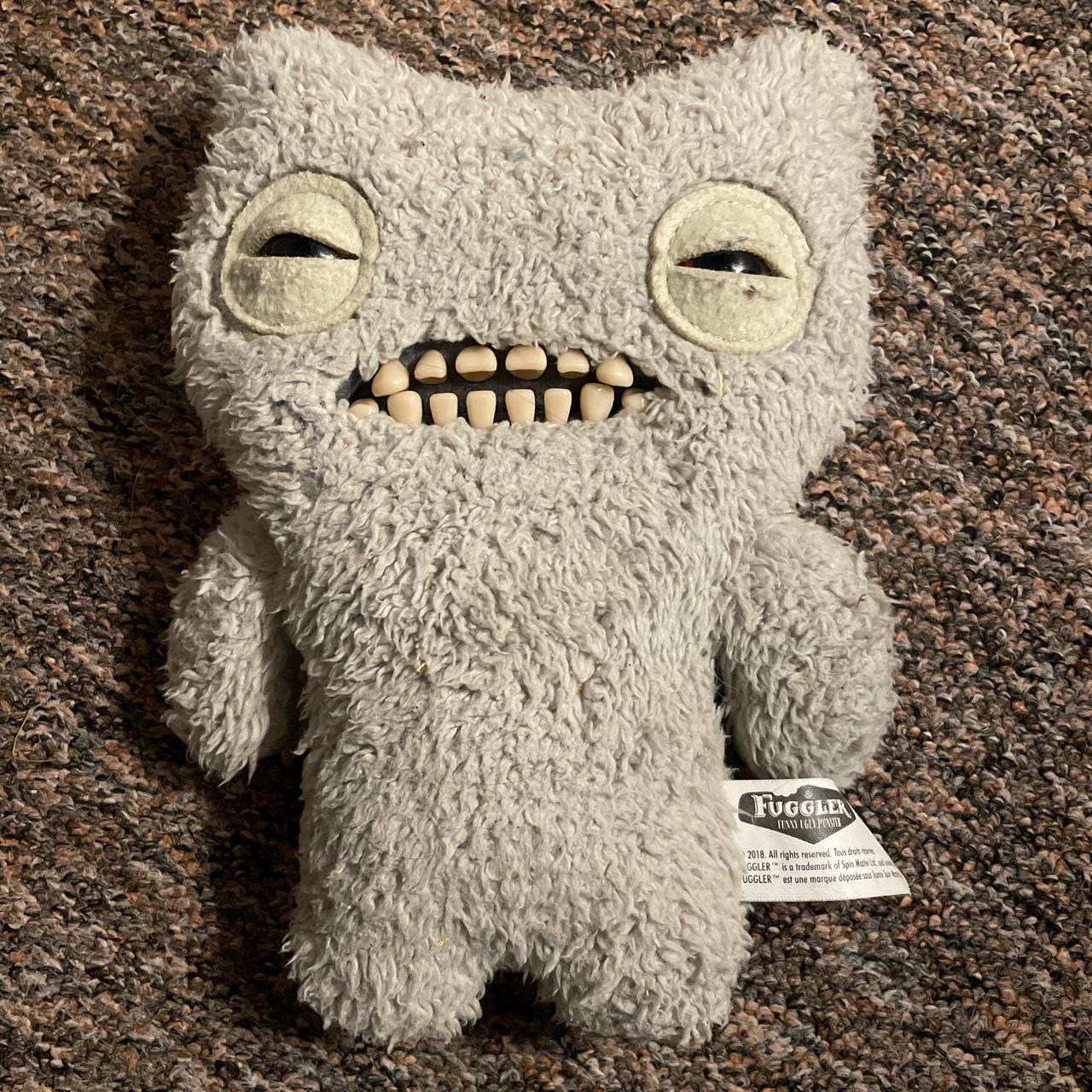 Grey Fuggler doll. Got as a family gift but it’s... - Depop