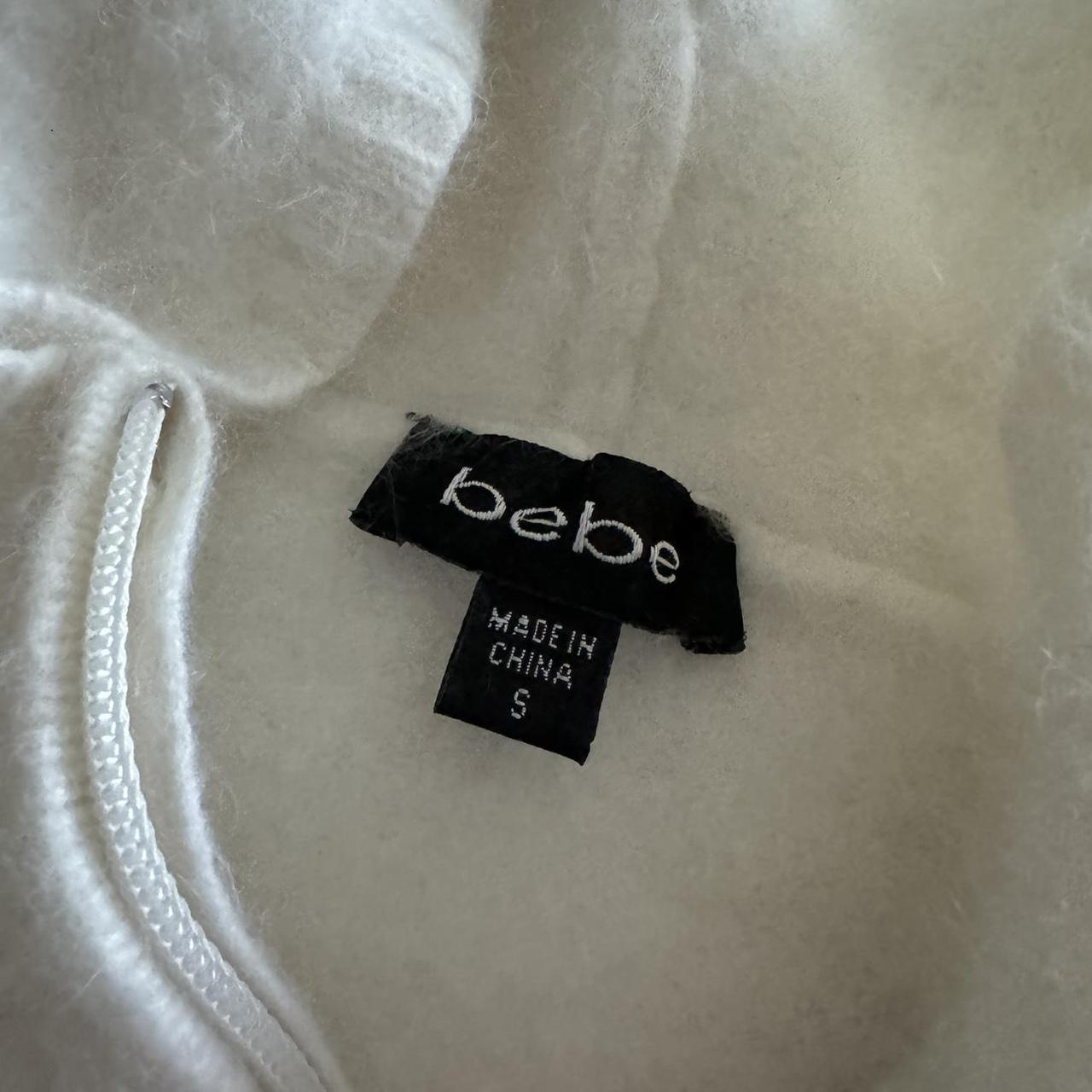 fitted white bebe sweater! such a unique find!... - Depop