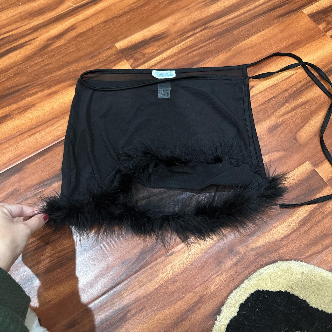 Rave black mesh and feather mini skirt. Never been... - Depop