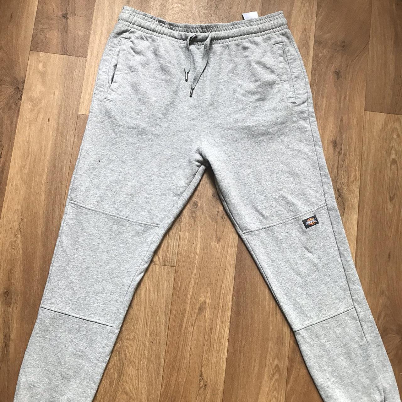 Grey dickies joggers lightly worn has a tiny hole... - Depop