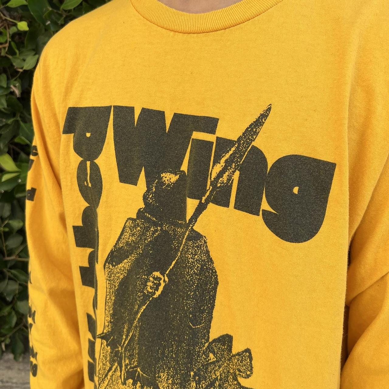 Webbed Wing Long Sleeve Band tee - used - yellow... - Depop