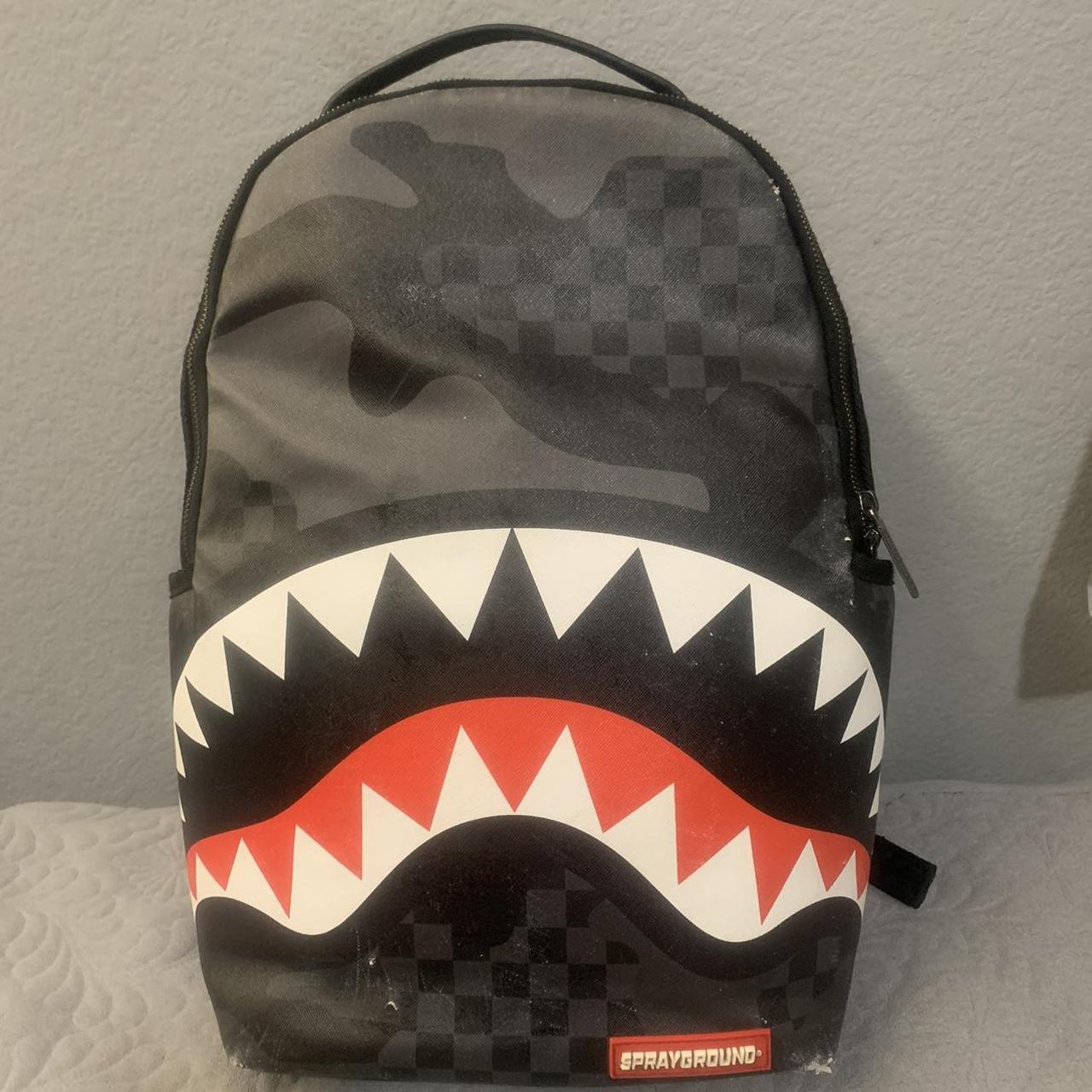 Sprayground backpack -Has some scratch marks on the... - Depop
