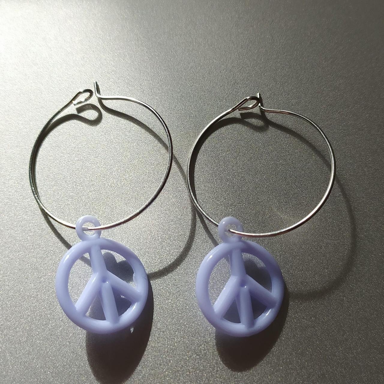 Purple/blue acrylic peace sign pendant hoop... - Depop