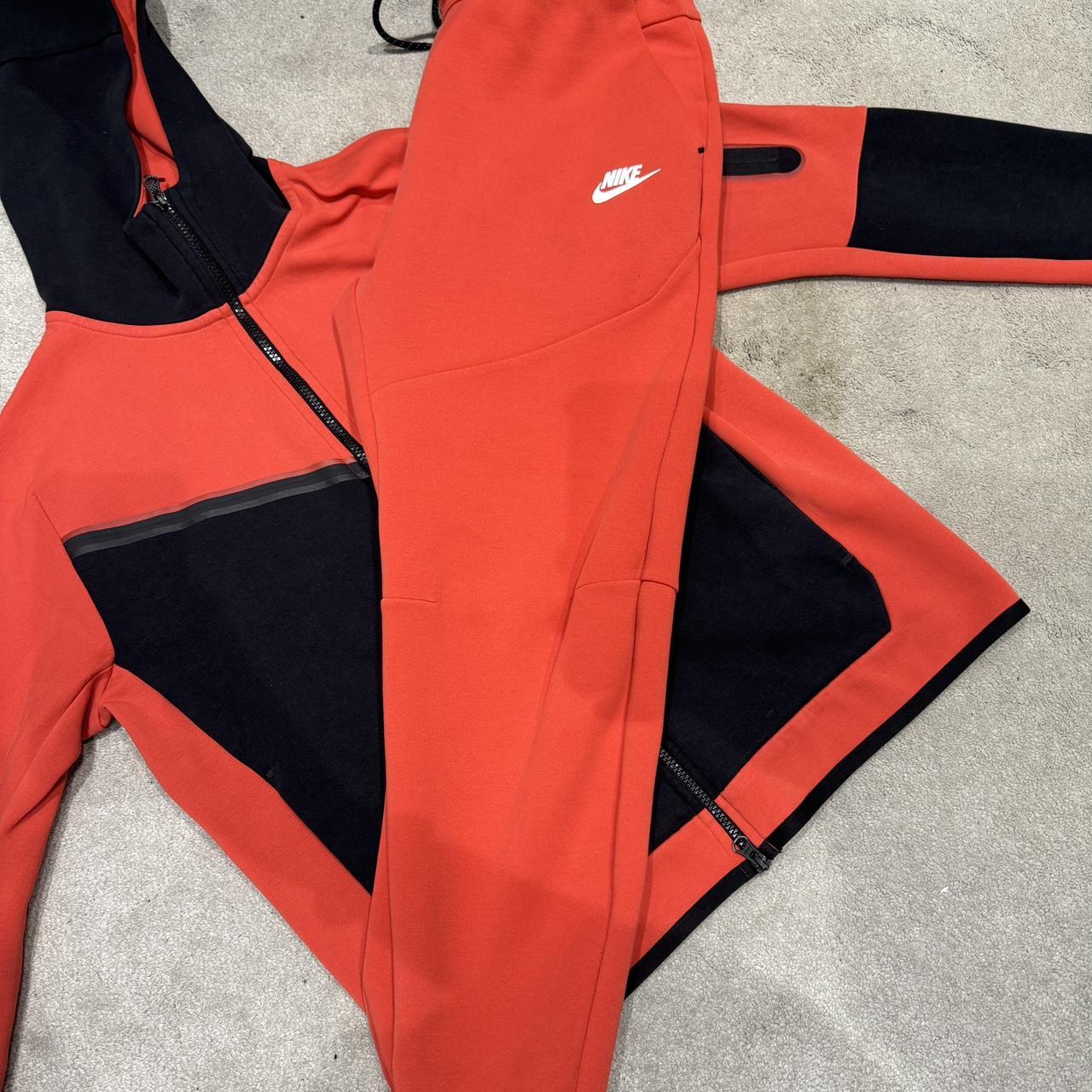 Red and Black Nike Tech Fleece Very good condition... - Depop