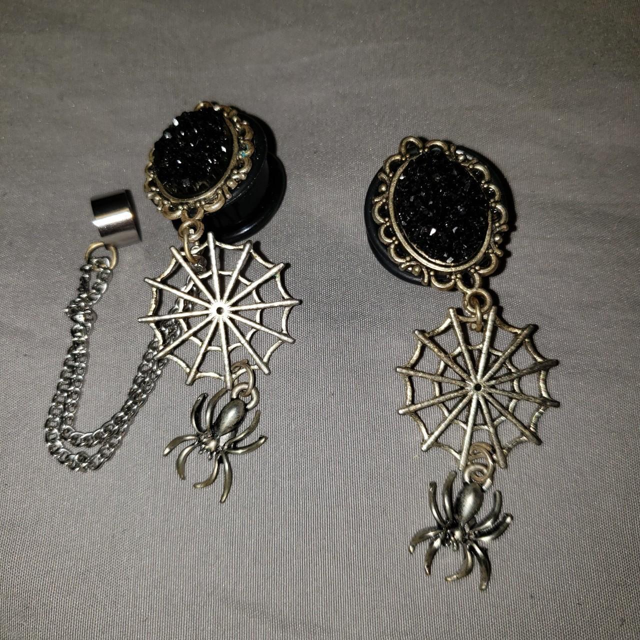 set of spider plugs w/faux chain earring branded... - Depop