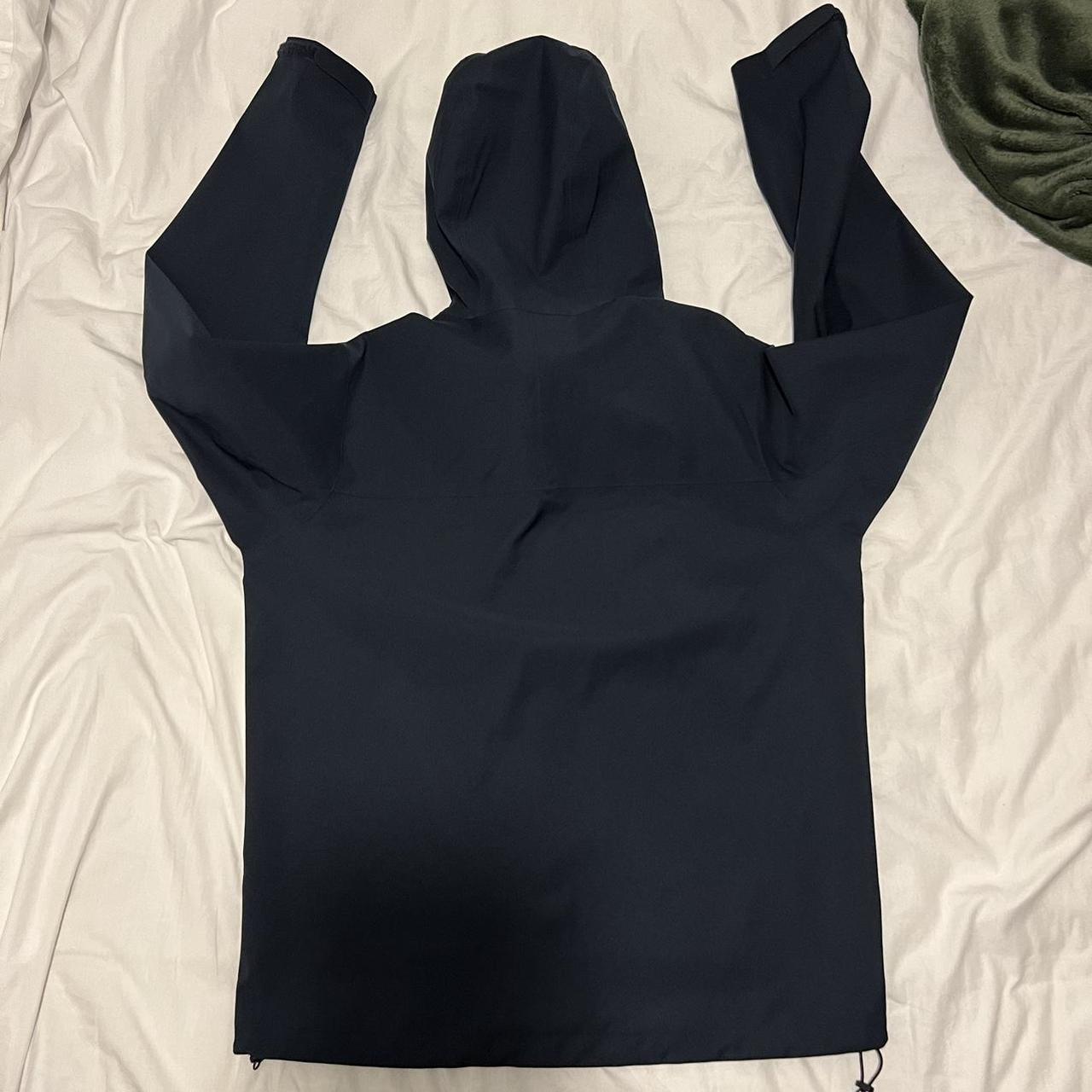 Uniqlo waterproof jacket navy size M brand new lost... - Depop