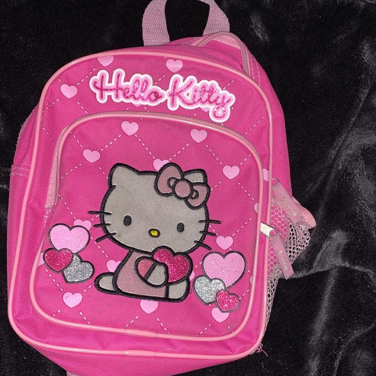 Hello kitty mini mini backpack Small stain and name... - Depop