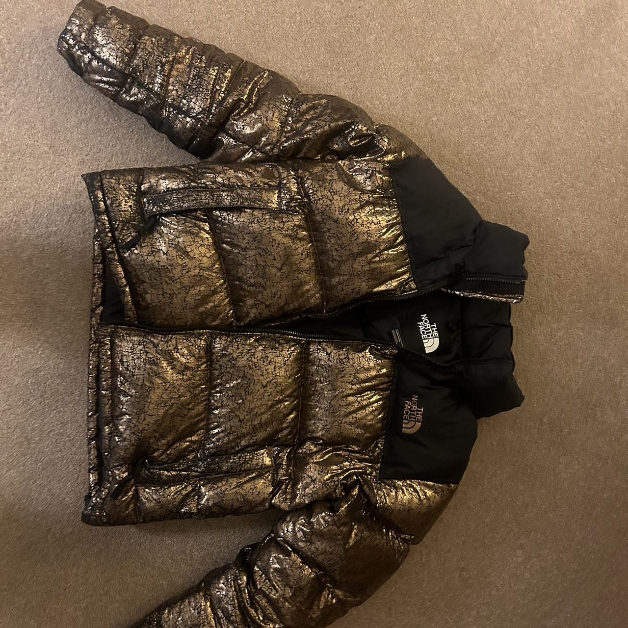 The North Face copper/gold puffer jacket. The North... - Depop