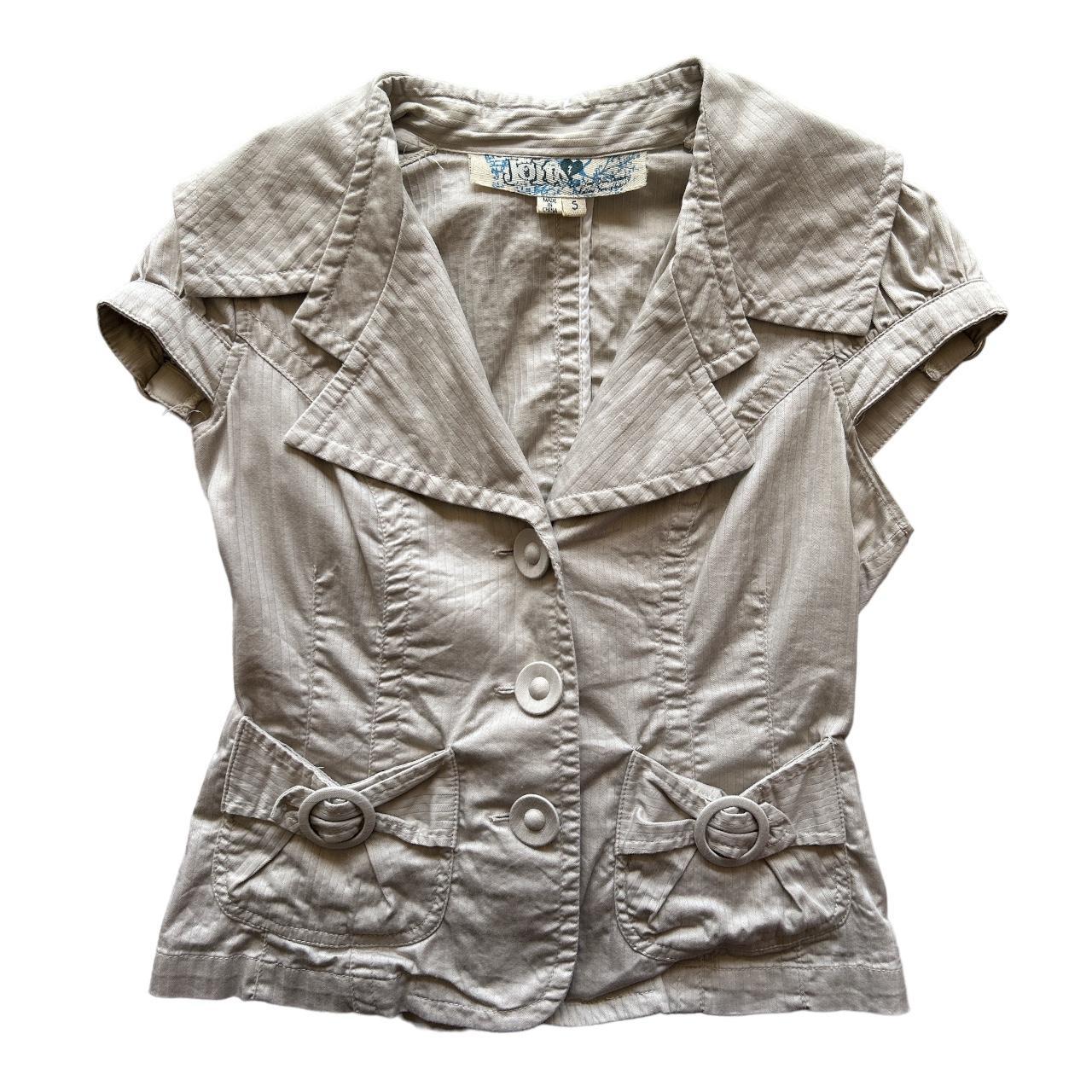 Adorable cream color top. The cutest button details... - Depop