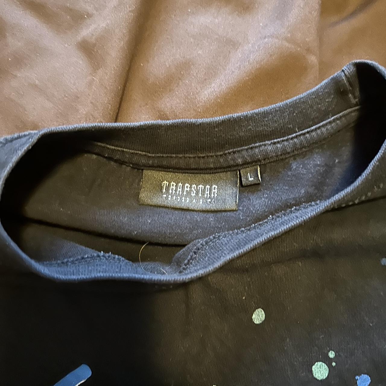 Black trapstar paint splatter Slight cracking in... - Depop