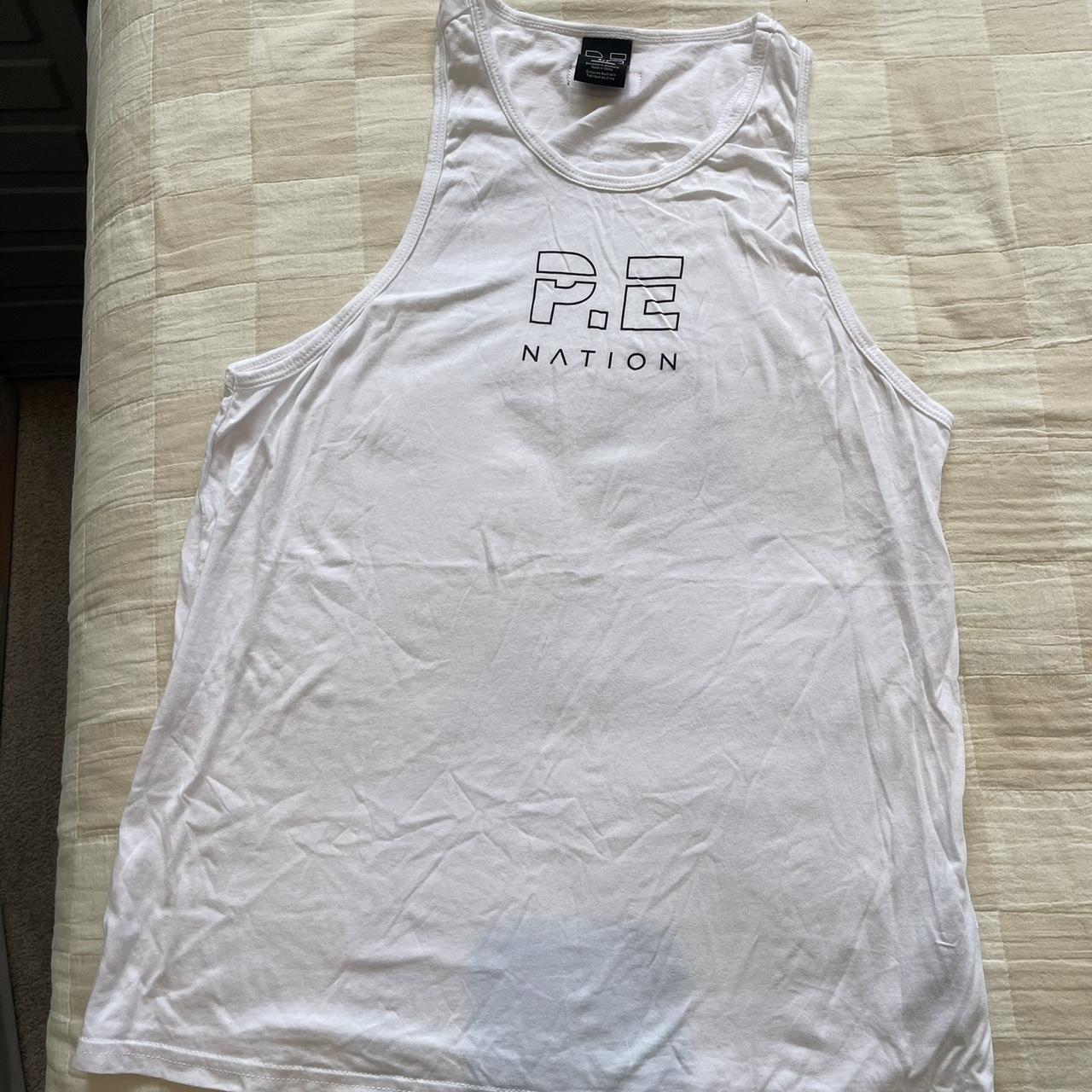 PE nation plain white singlet black writing never... - Depop