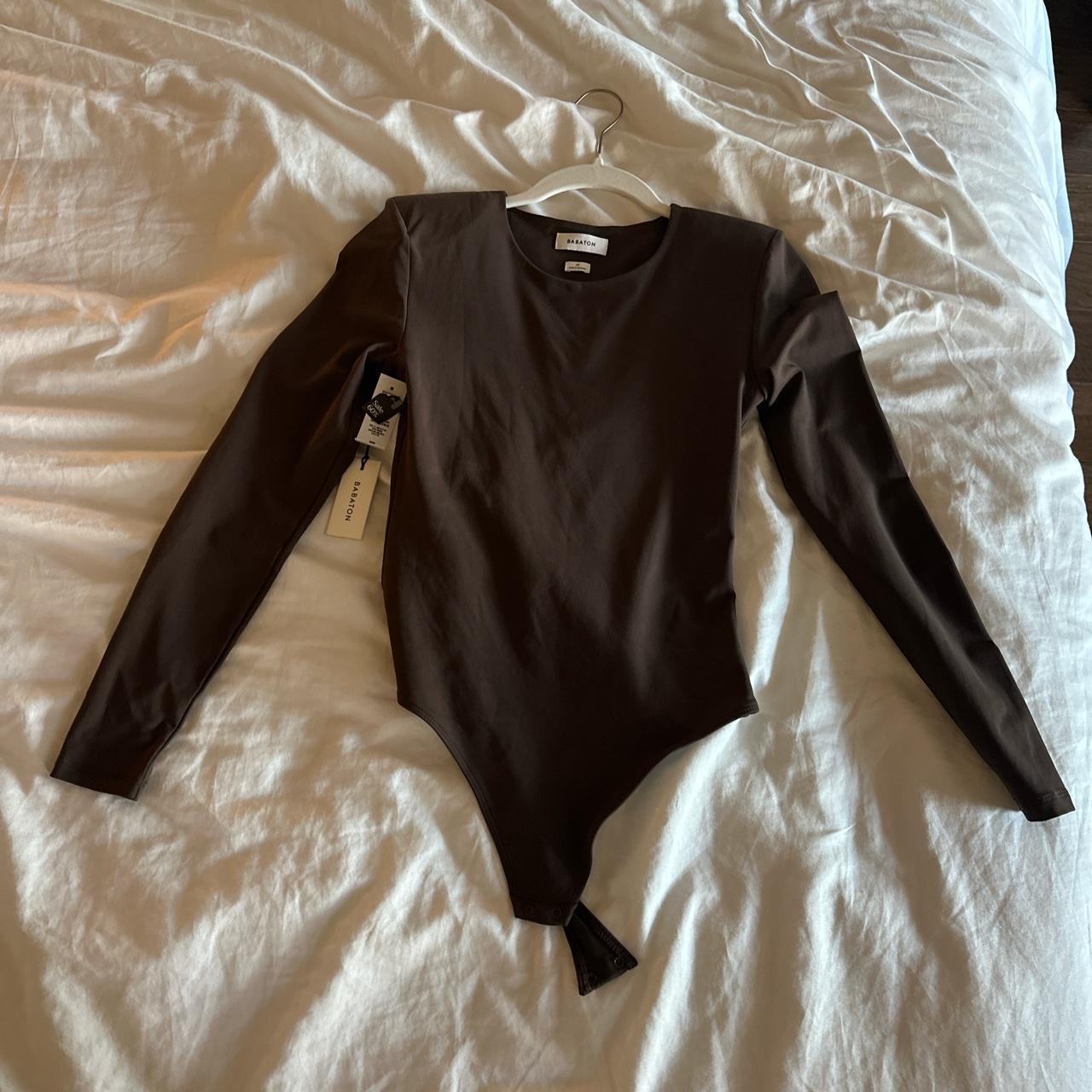 Babaton chocolate brown shoulder pad bodysuit. Size... - Depop