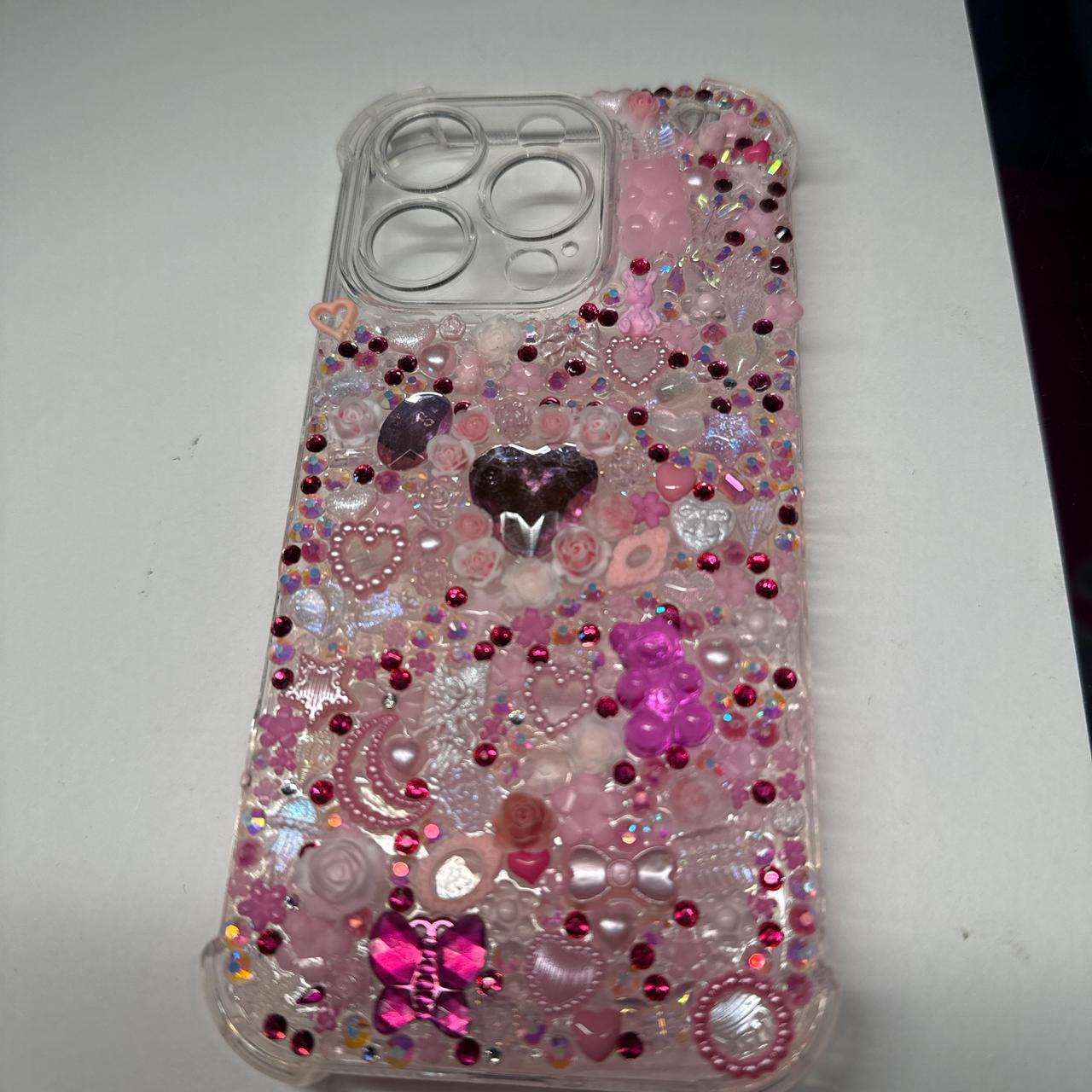 Pink bedazzled iphone 16 pro case with heart charm... | Depop