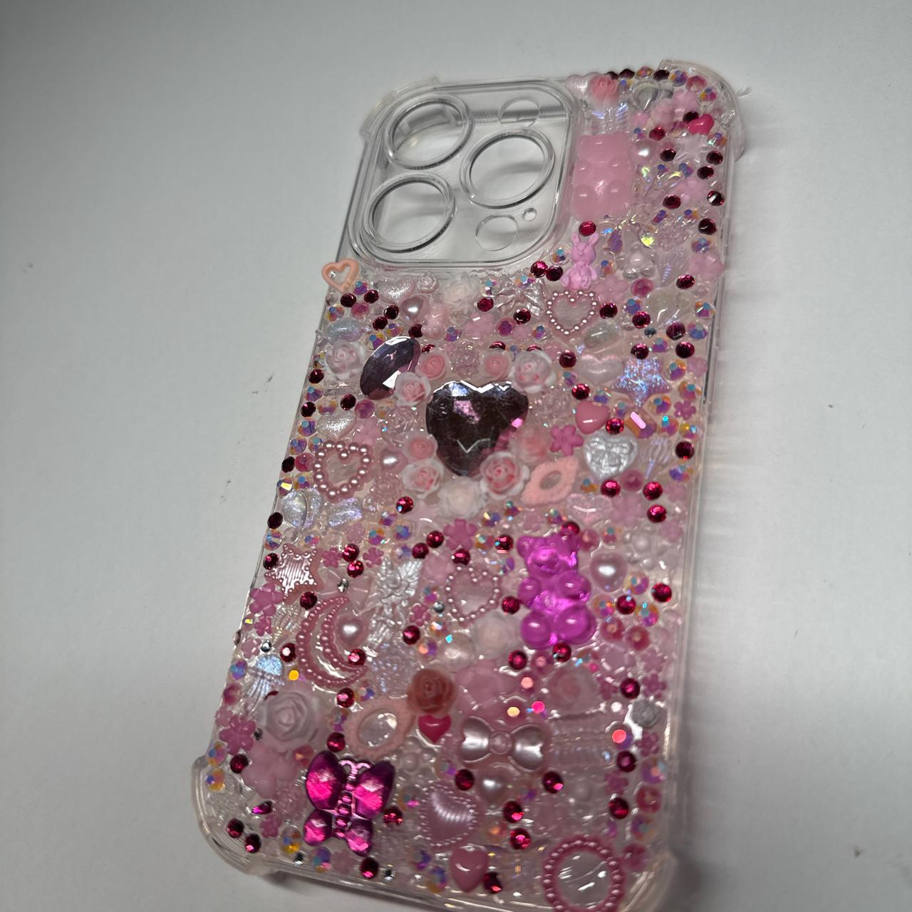 Pink bedazzled iphone 16 pro case with heart charm... | Depop