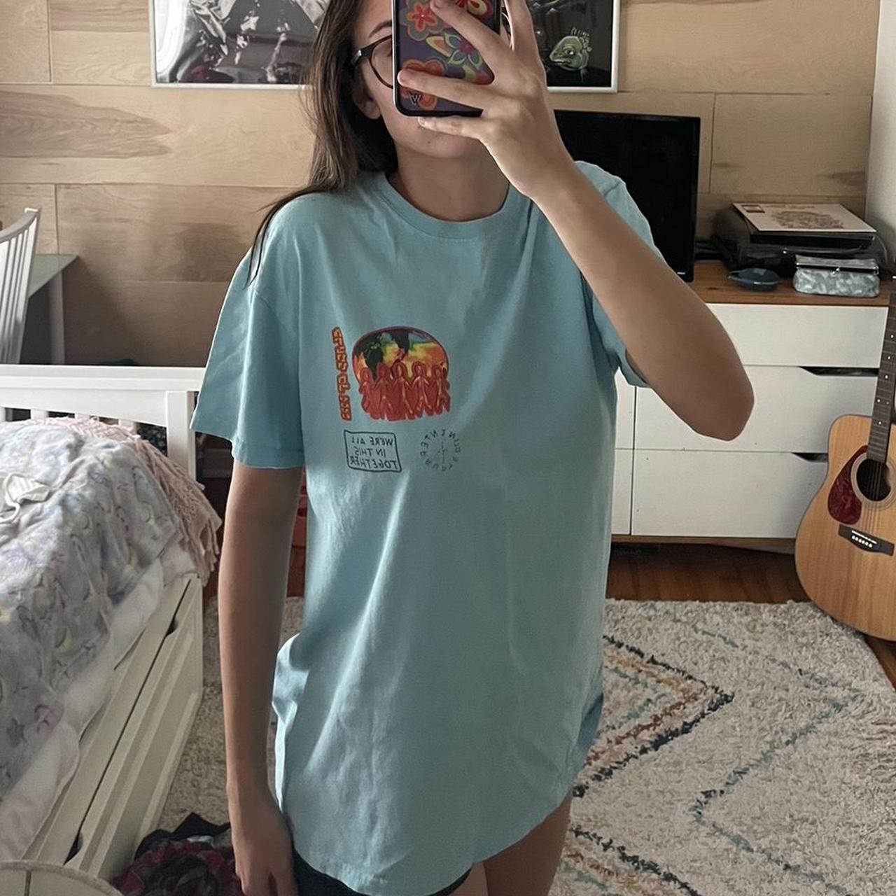 Travis Scott blue and multi coloured tee Fits like. Depop