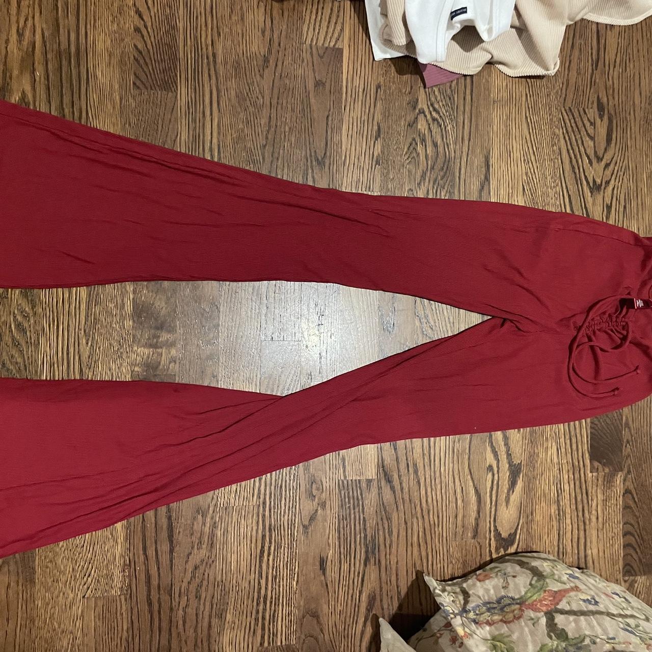 Red skims flare pants xs worn once - Depop