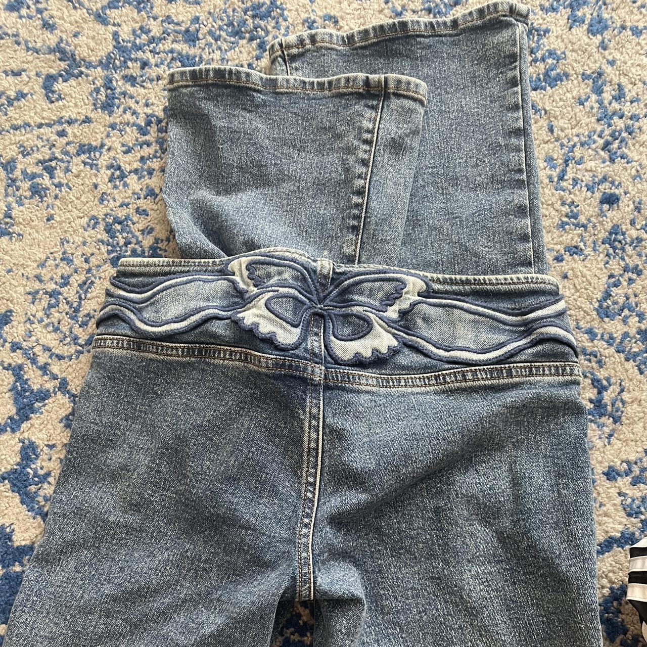 The cutest flare low rise jeans with butterfly on... - Depop