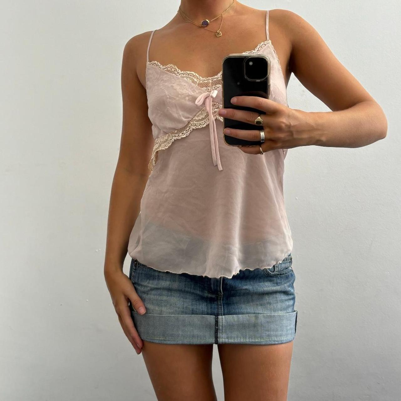 baby pink mesh cami top with bow seen here on a... - Depop
