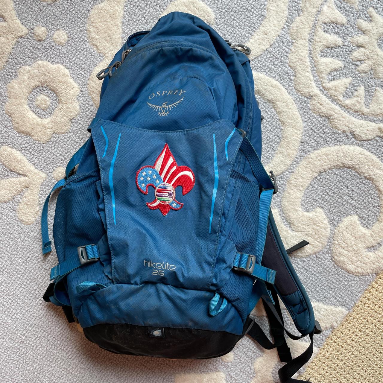 very worn osprey backpack, front pocket zipper is... - Depop