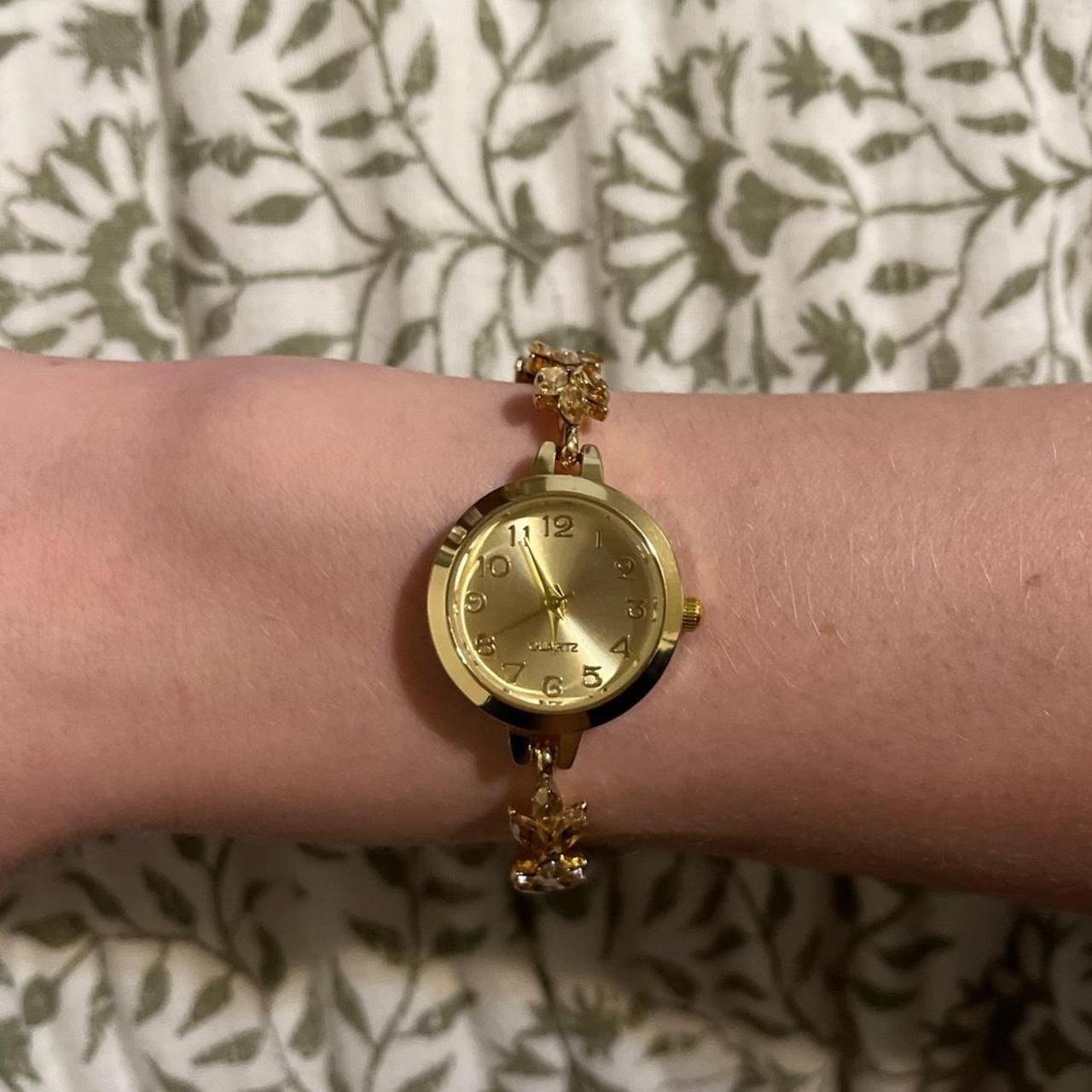 Dainty gold watch with beautiful crystal leaves on... - Depop