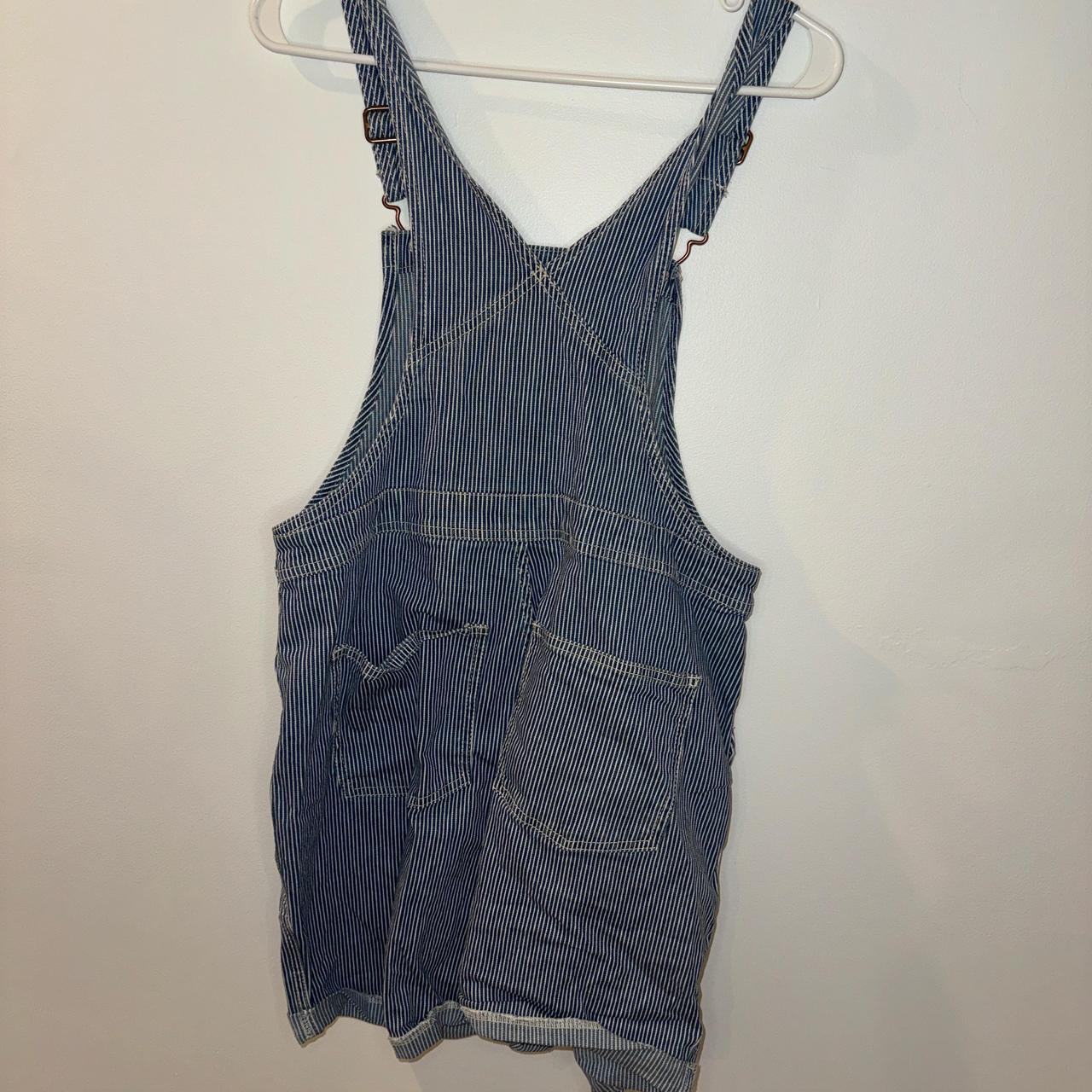 Blue and white striped overalls with a pocket on the... - Depop
